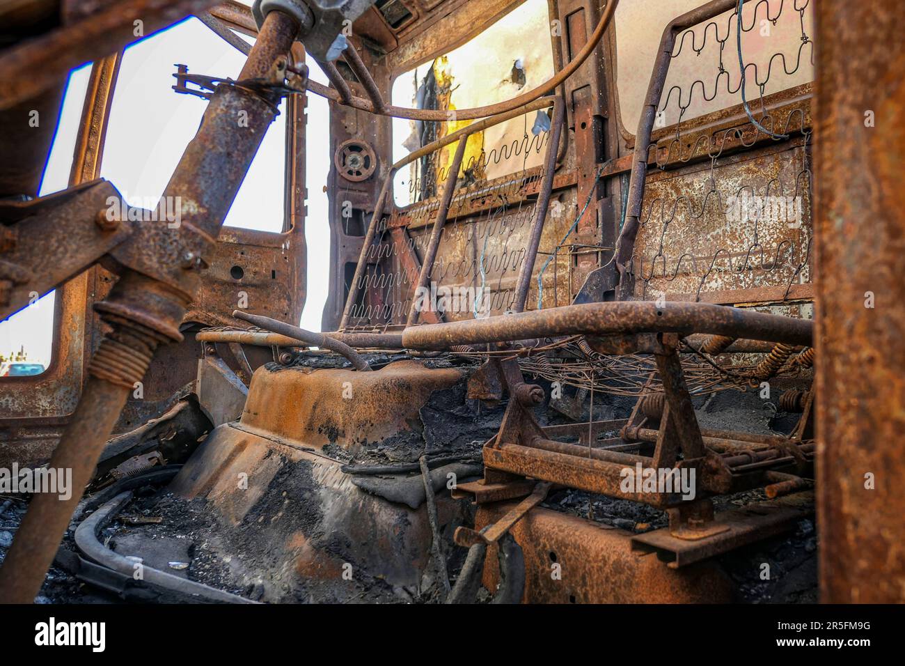 the inside of a burned out vehicle Stock Photo - Alamy