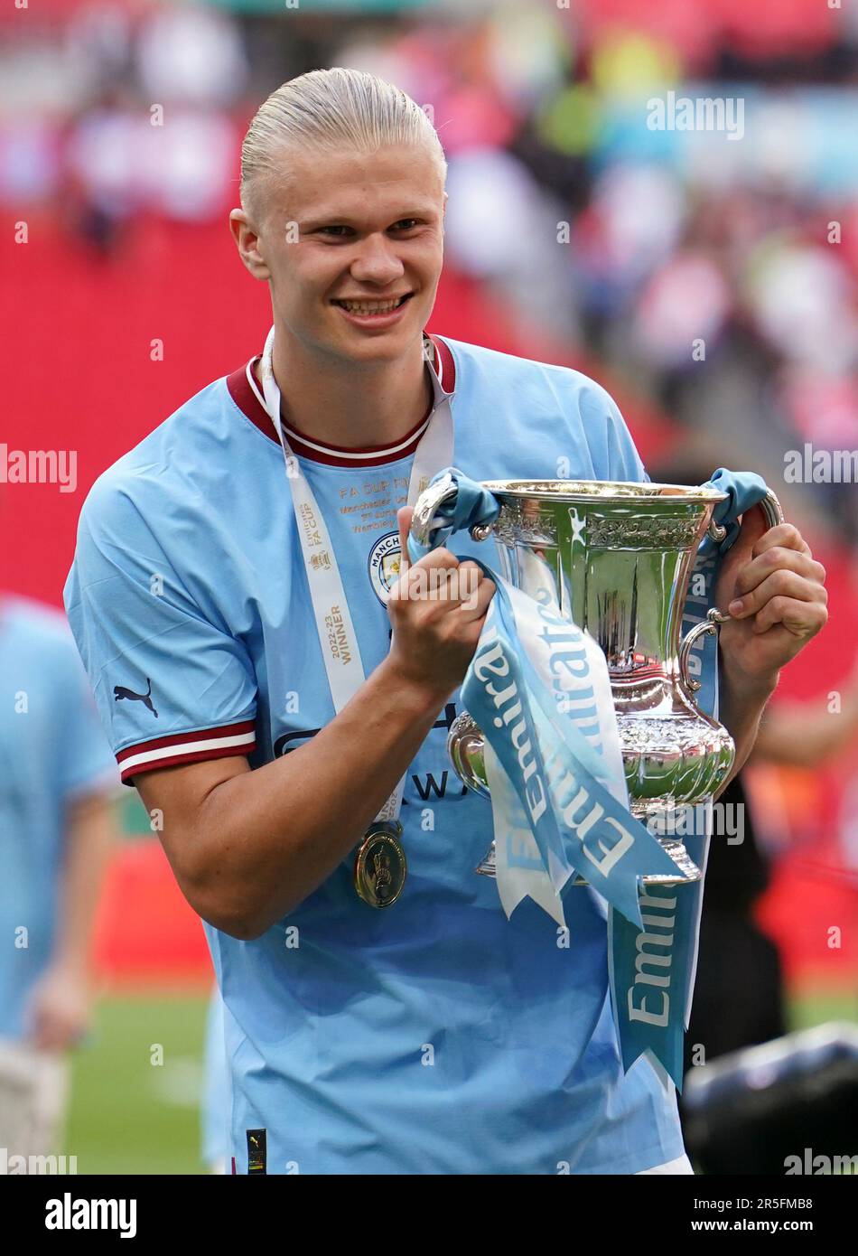 Manchester City's Erling Haland celebrates with the FA Cup following ...