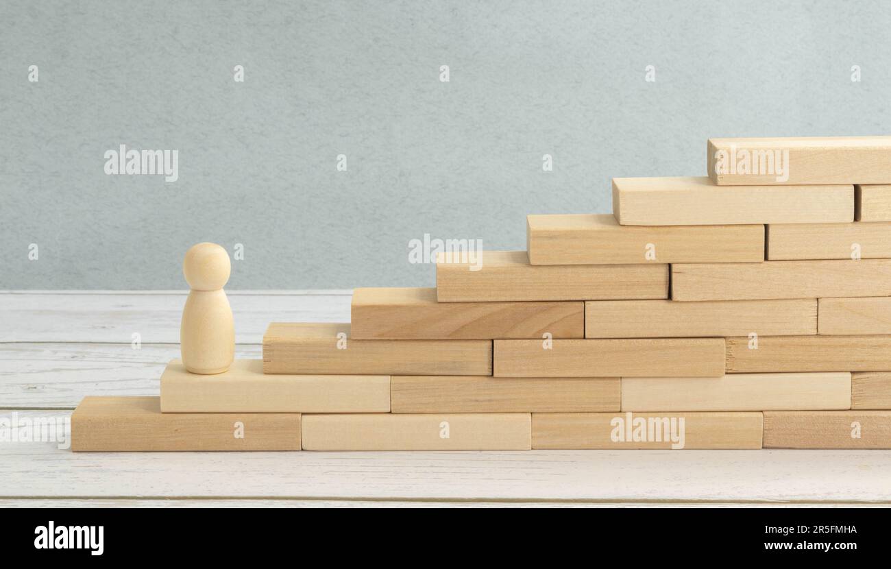 Businessman going up. the person is climbing the ladder leading to ...