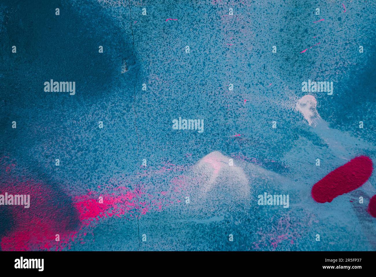 Messy paint strokes and smudges on an old painted wall background ...