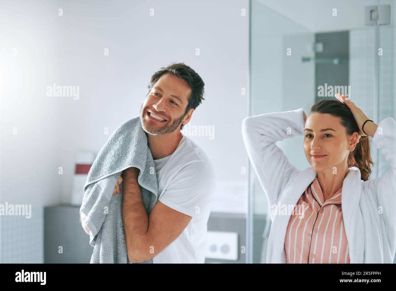 Were ready to take on this day. a couple getting ready together in the ...