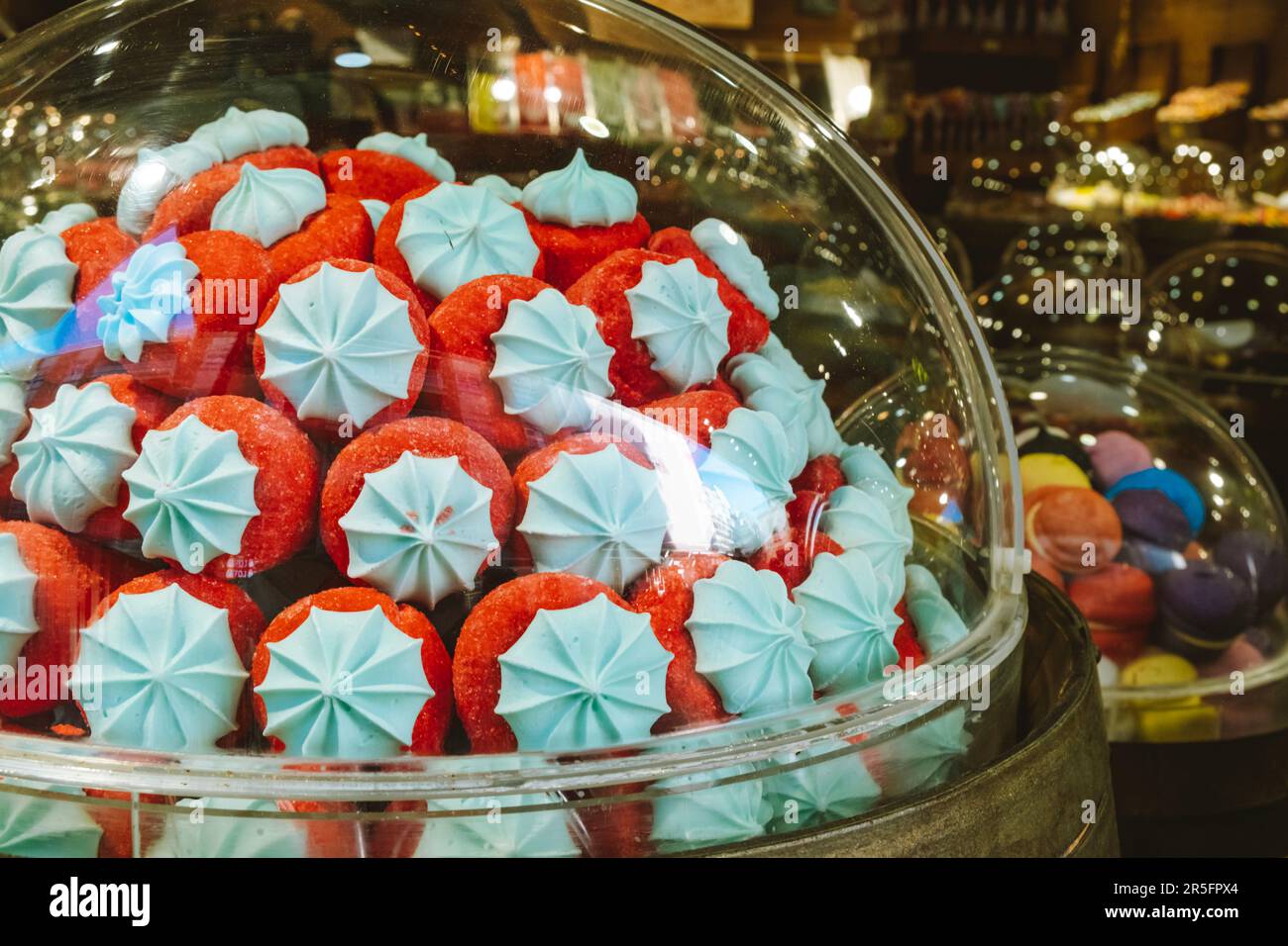 Delicious sweets in showcase of local shop. Candy store. Bakery Stock ...