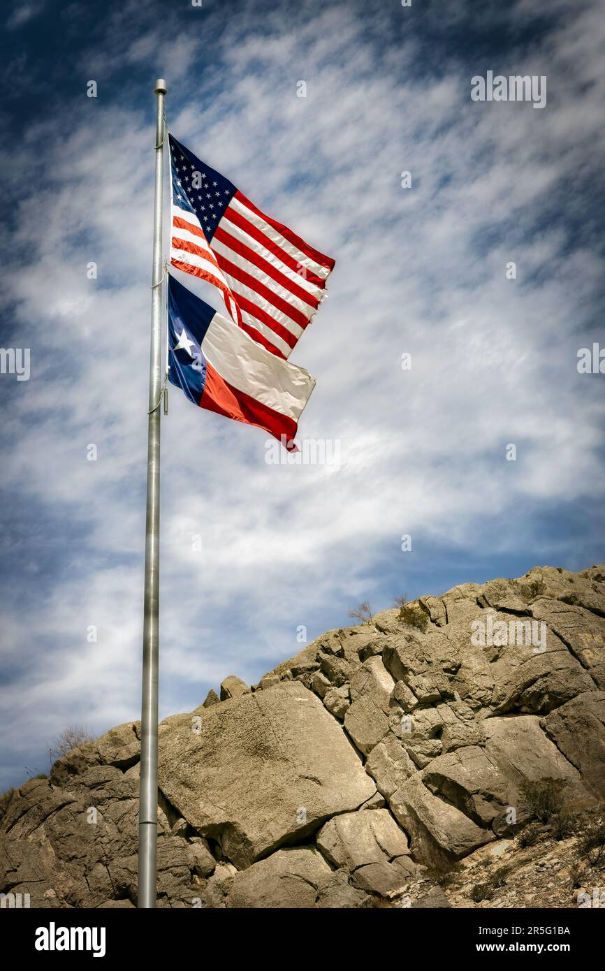 The American and Texas state flags flying above Murchison Park at El ...