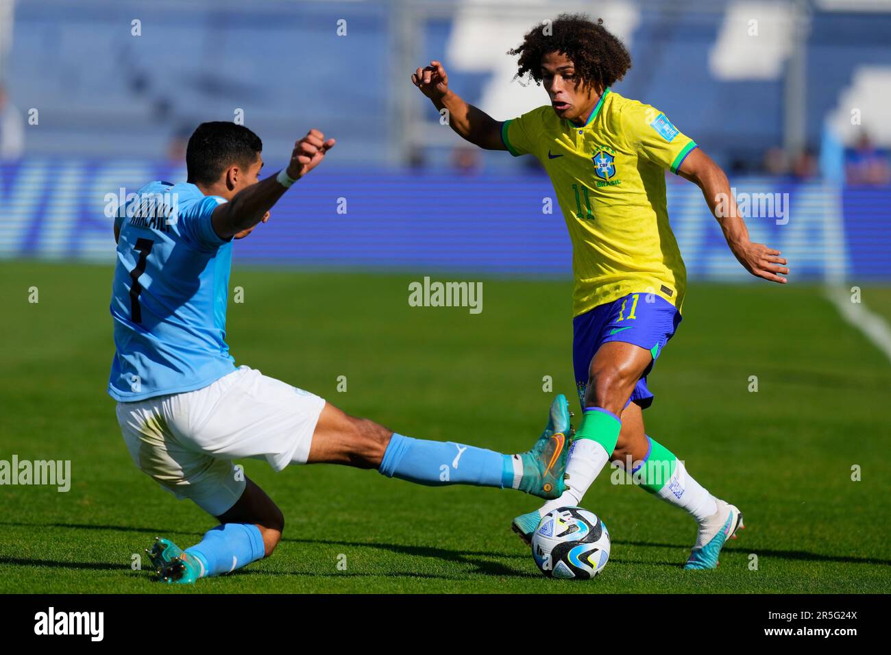 Brazil's Guilherme Biro, right, is challenged by Israel's Anan Khalaili ...
