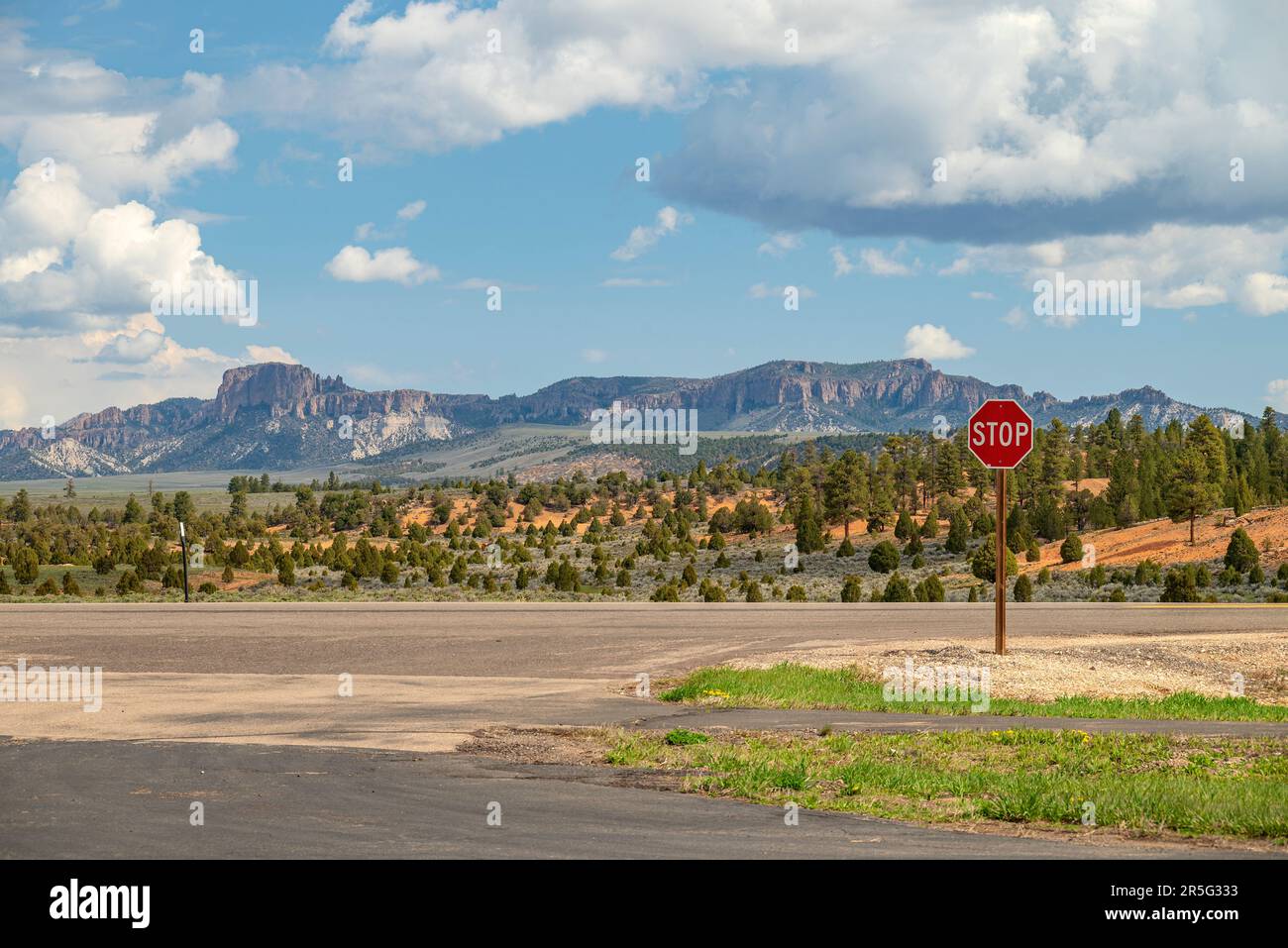 Stop sign and the view in a country road Utah state Stock Photo - Alamy
