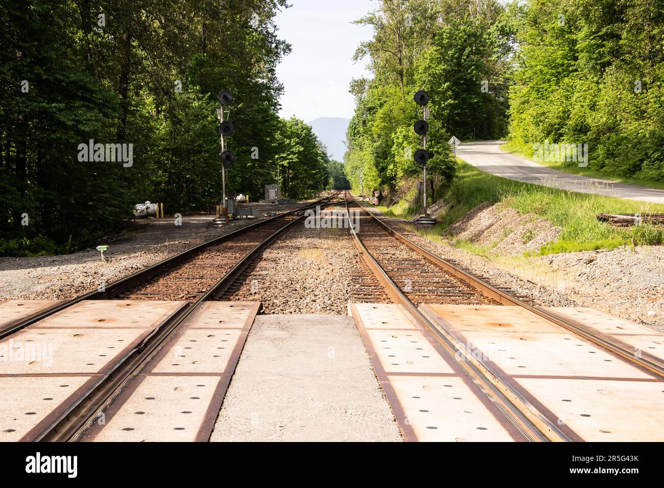 Train tracks at railroad crossing on Malcolm Road in Deroche, Mission ...