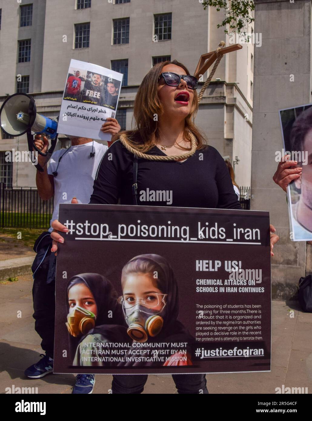 London, England, UK. 3rd June, 2023. A demonstrator with a noose around ...