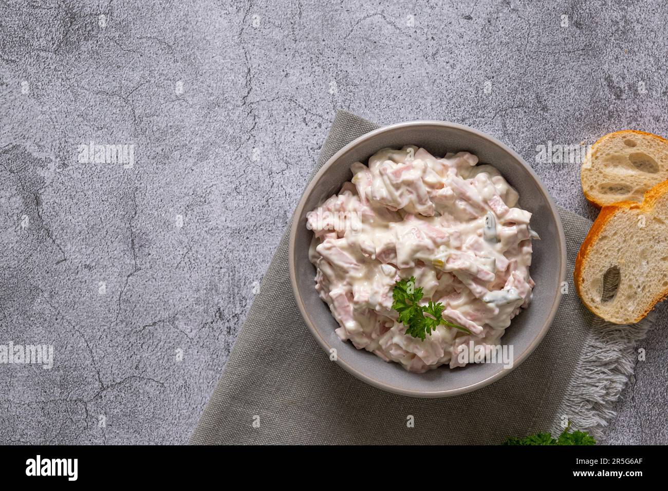 Traditional German meat salad with pickled cucumbers. Top view Stock ...