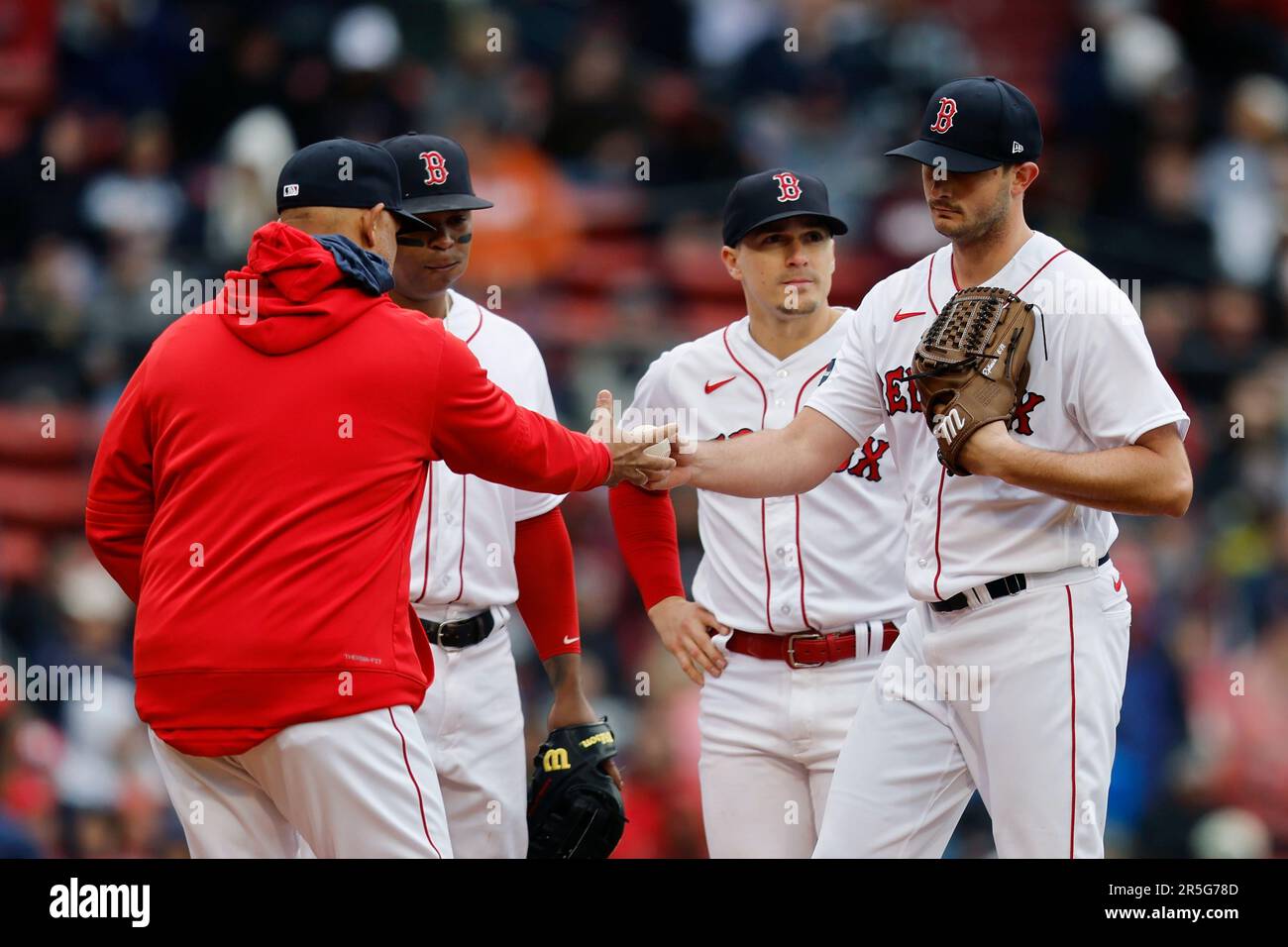 Boston Red Sox manager Alex Cora relieves Garrett Whitlock, right ...