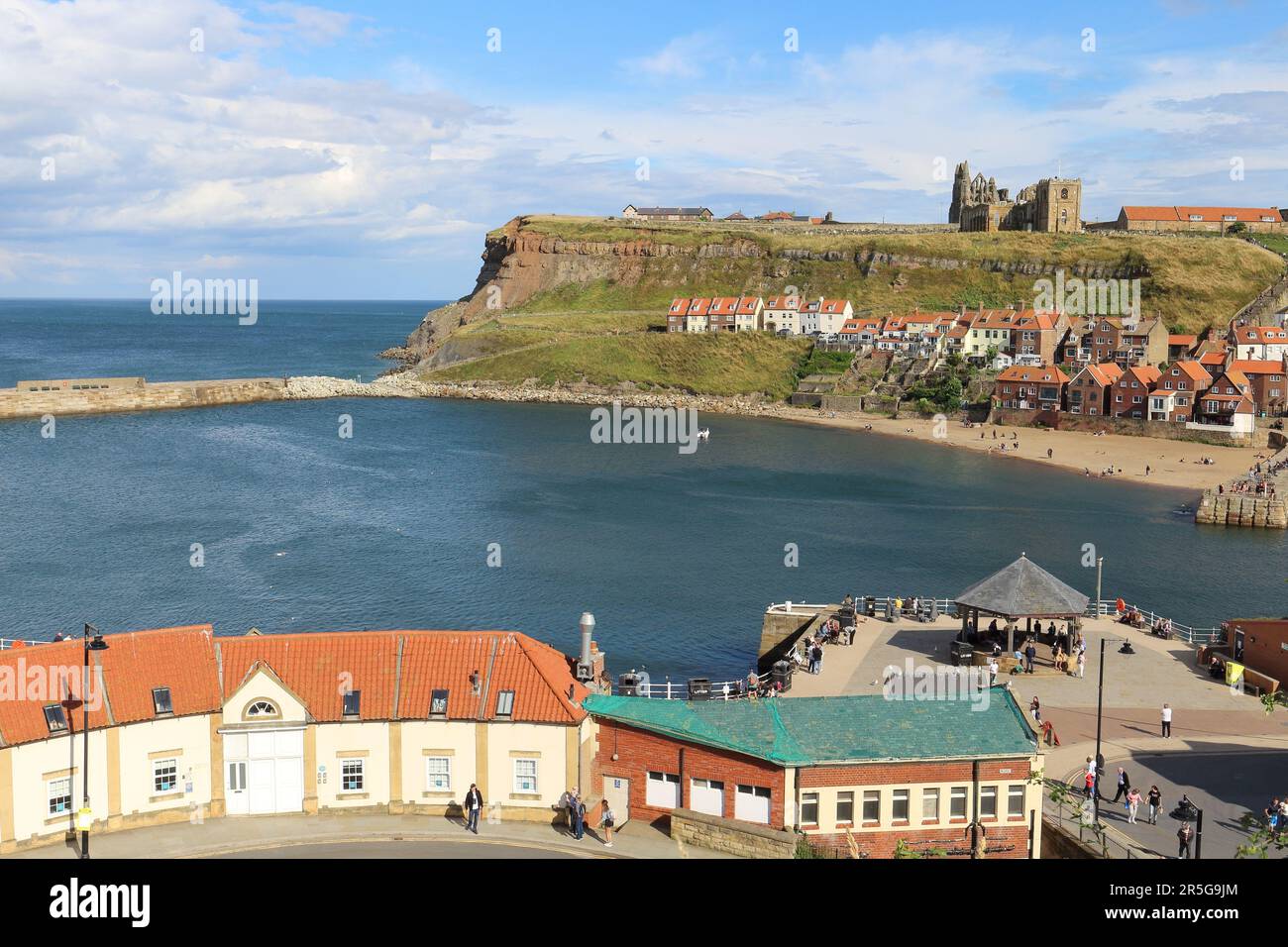 View over Whitby Harbour on a summer day looking towards the abbey ...