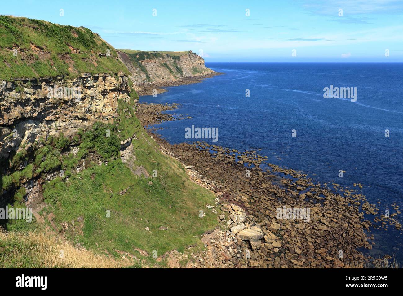 View of the cliffs and the sea from the coastal path between Whitby and ...