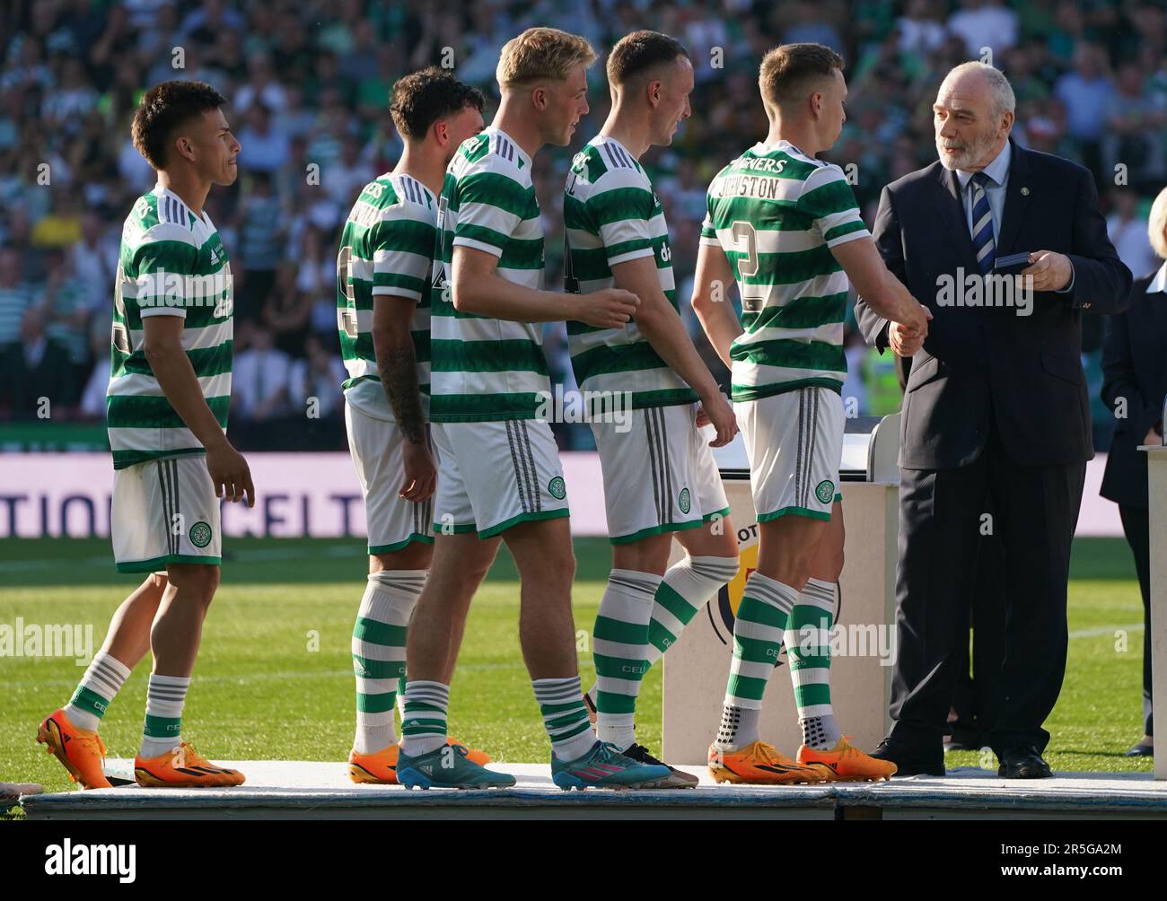 Scottish Football League president Rod Petrie (right) hands Celtic ...