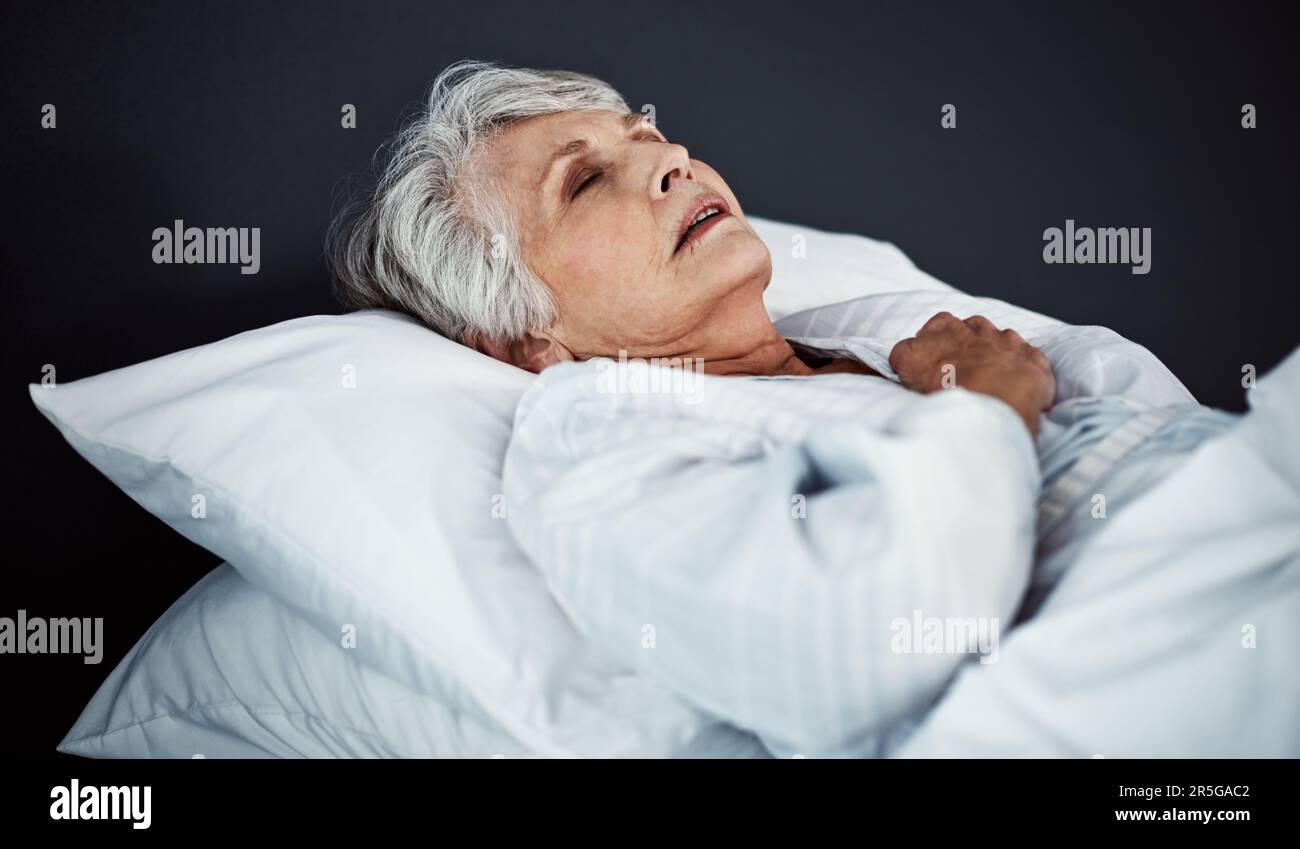 Her health is in decline. High angle shot of a sickly senior woman ...