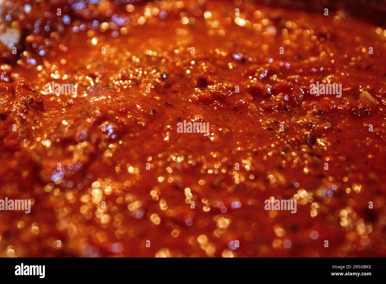 Traditionally cooked italian meat sauce Stock Photo - Alamy