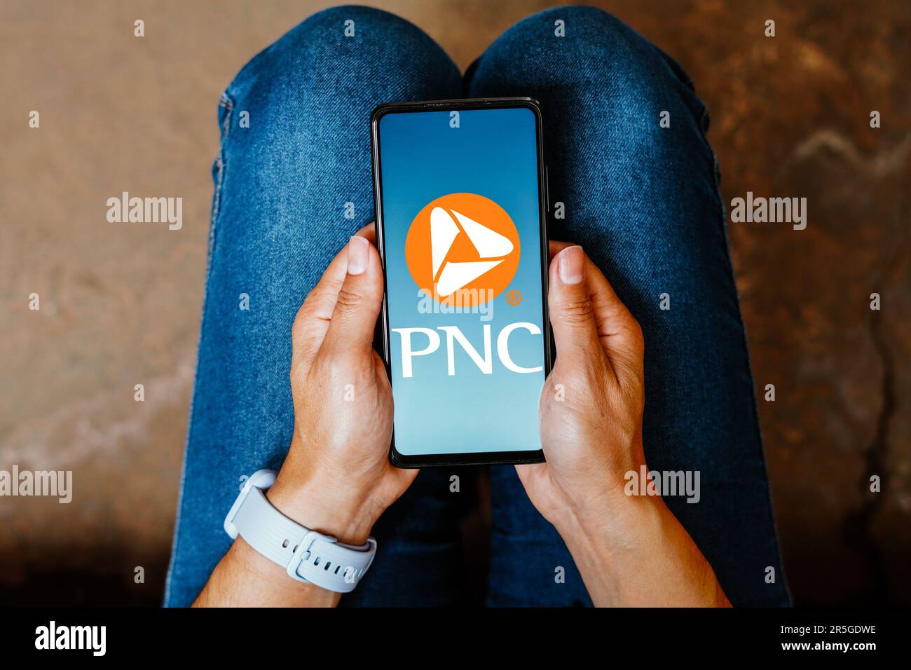 In this photo illustration, the PNC Financial Services (PNC Bank) logo ...