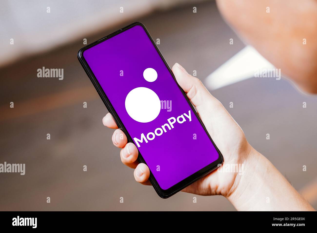 In this photo illustration, the MoonPay logo is displayed on a ...