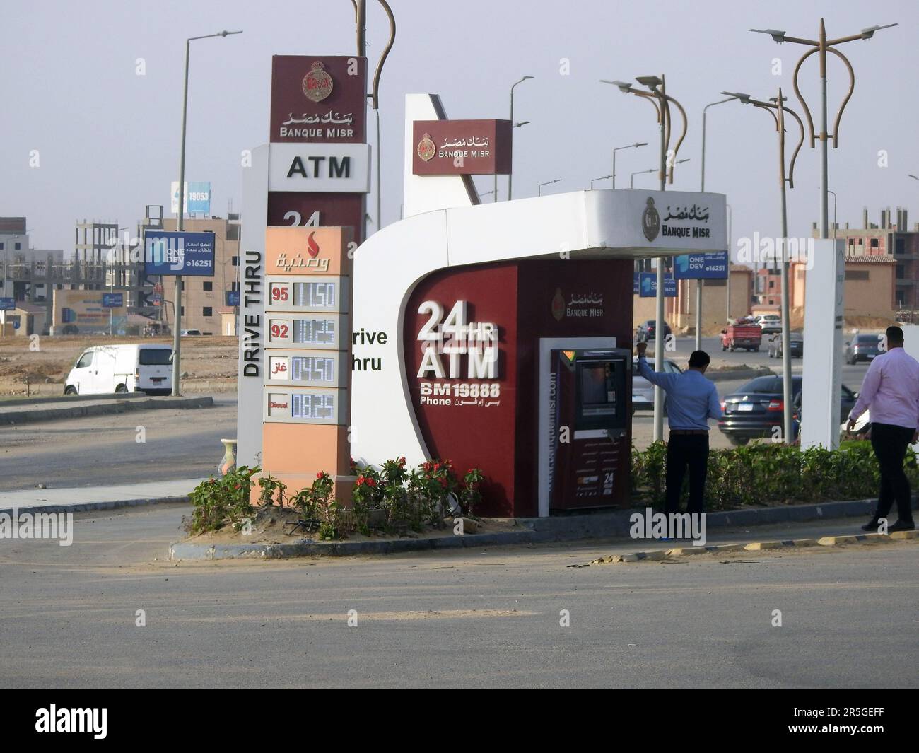 Cairo, Egypt, May 20 2023: Automated Teller Machine drive-thru lanes providing access to ATMs ...