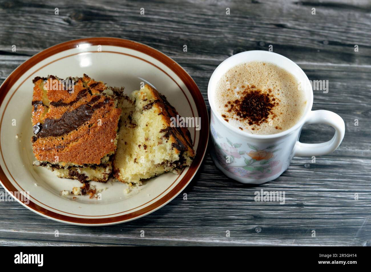 A cappuccino topped with creamy froth and coffee, an espresso-based ...