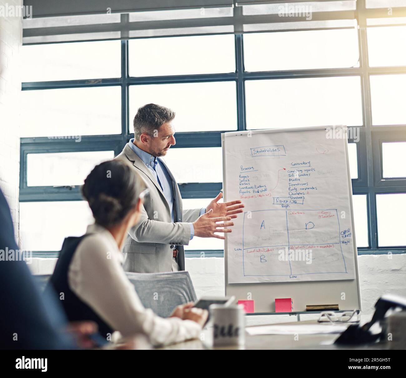 Success is built on good communication. a businessman giving a ...