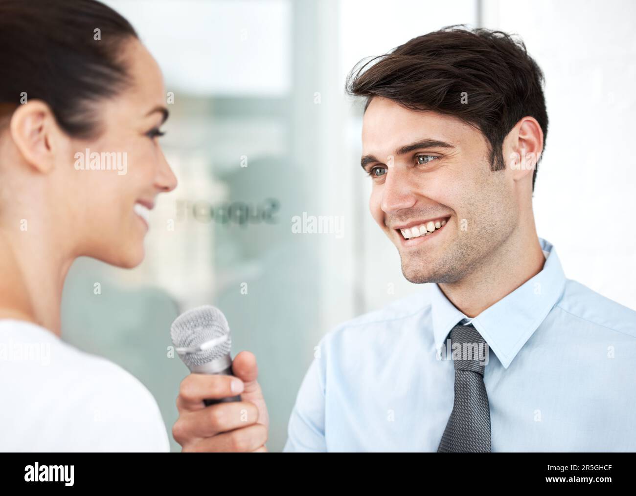 Tell us your advice for other businesspeople. Young executive being ...