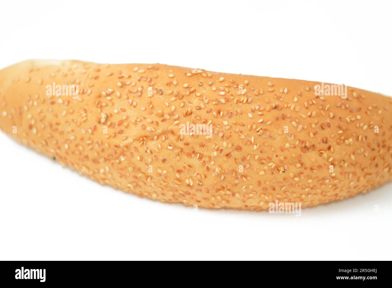 Long sesame bun bread, a fresh baked loaf of bread French Fino ready to ...