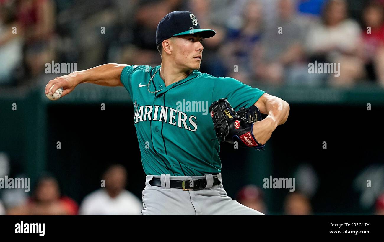 Seattle Mariners starting pitcher Bryan Woo throws to the Texas Rangers ...