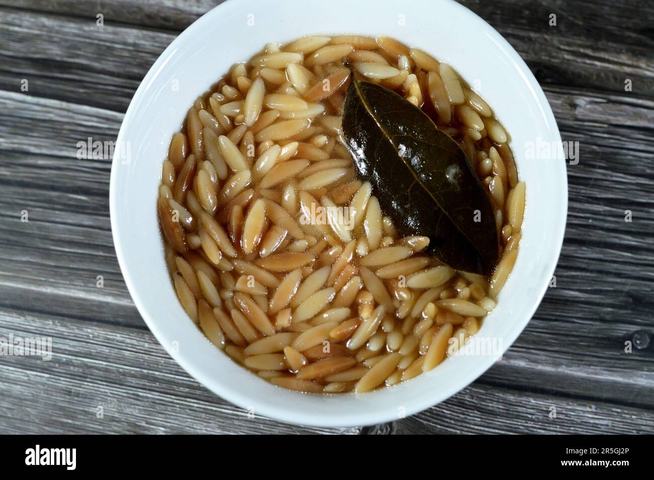 Middle Eastern Orzo Pasta Egyptian soup also known as Shorbet Lesan El ...