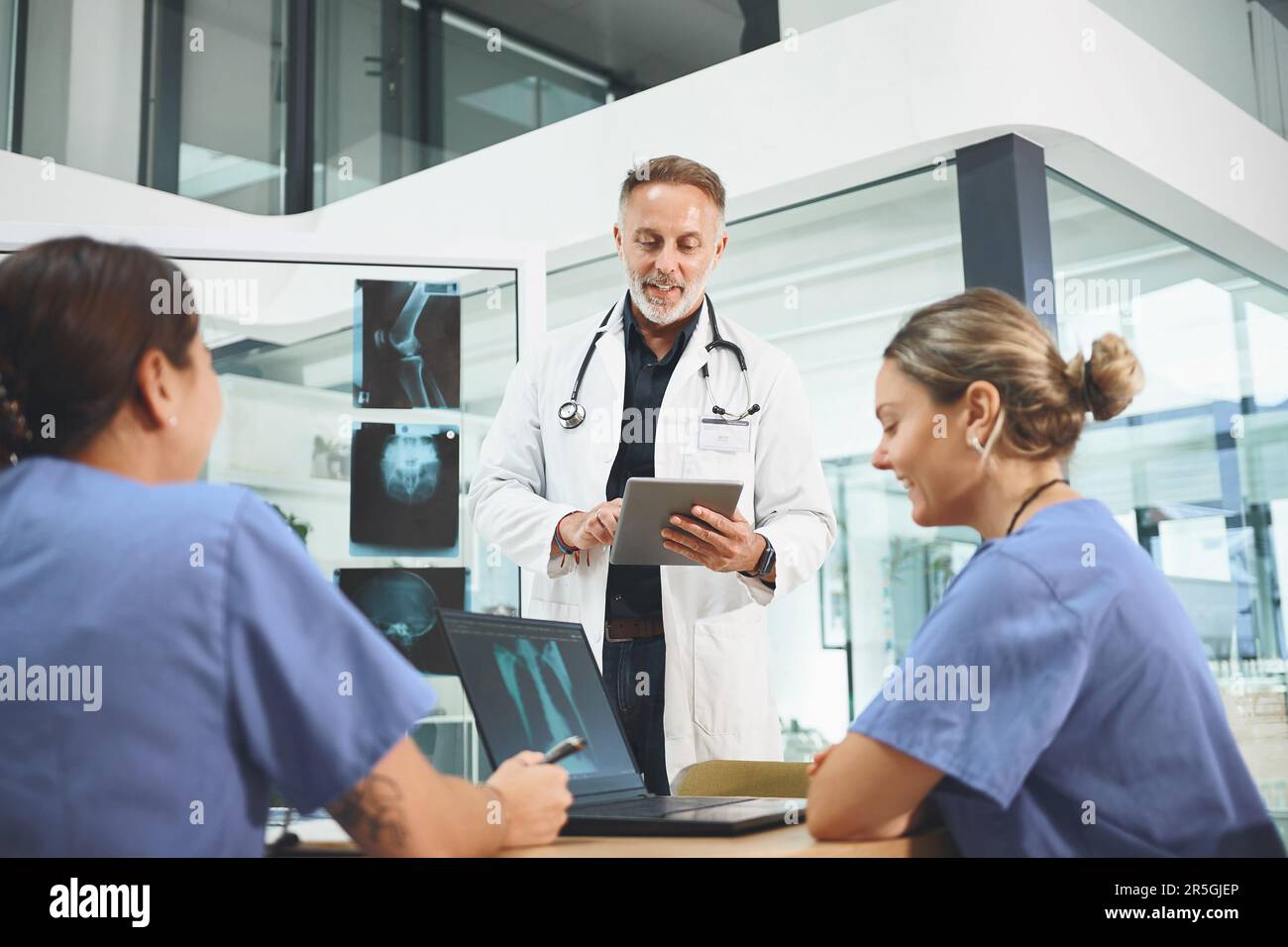 The patient comes first, no matter what. a mature doctor leading a ...