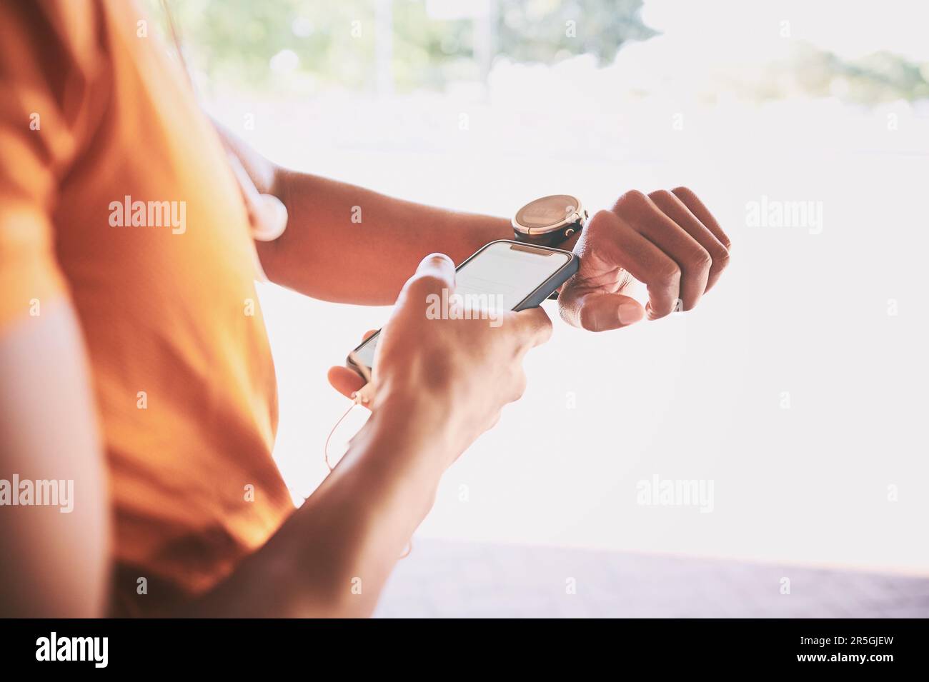 The tech that takes your workout to the next level. a man pairing his ...