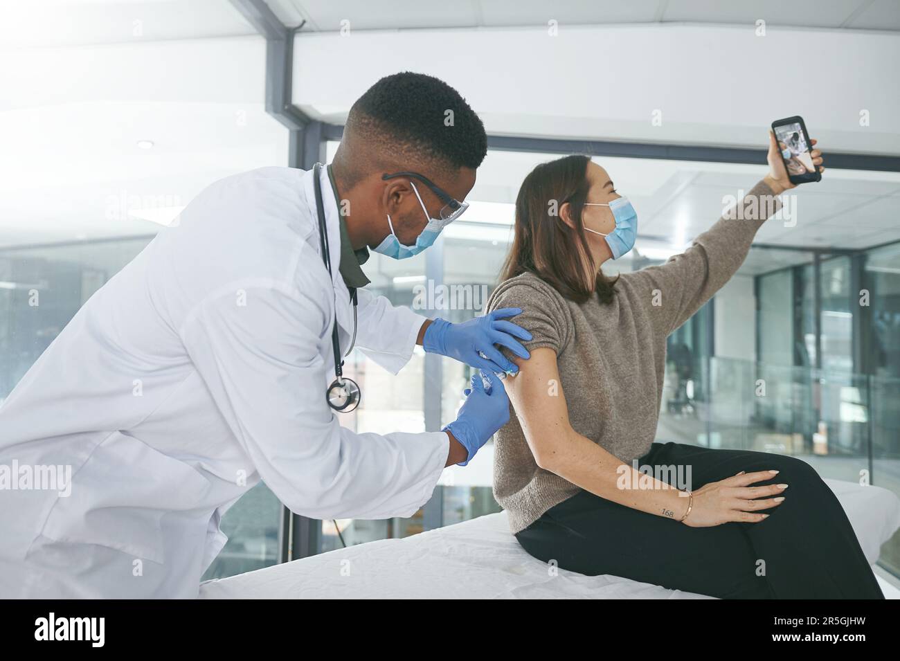 I need to get this on camera. a young doctor giving a patient an ...