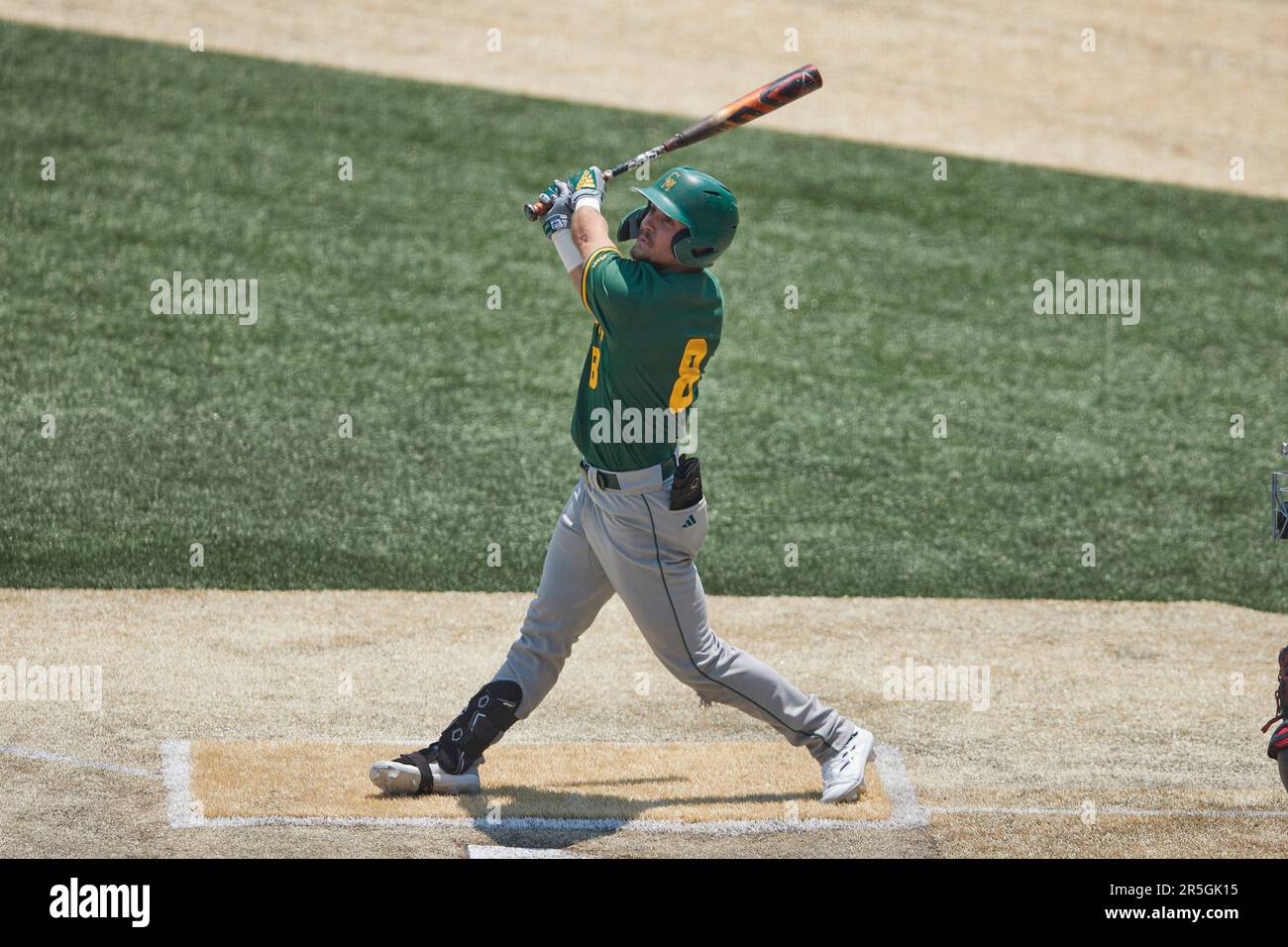 Derek Wood (8) of the George Mason Patriots follows through on his ...