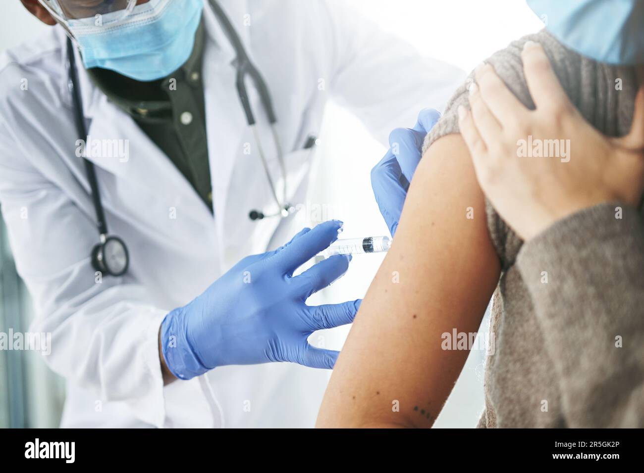 This will only take one second. an unrecognizable doctor giving a ...