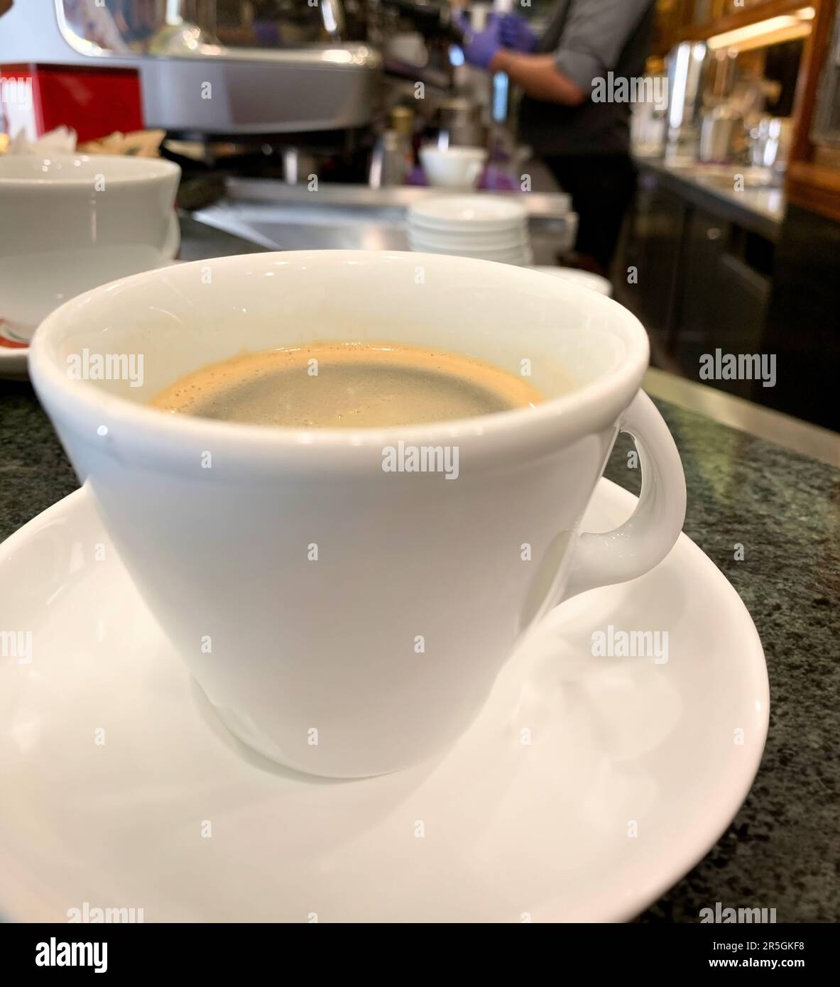 A captivating close-up shot of a freshly brewed Americano coffee ...