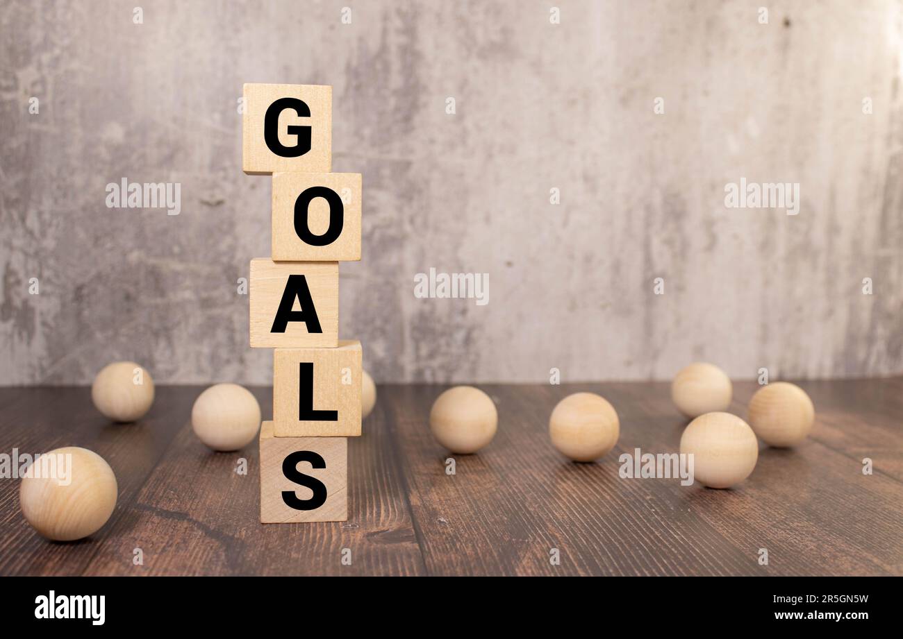 Goals word concept, word GOALS on wooden block Stock Photo - Alamy