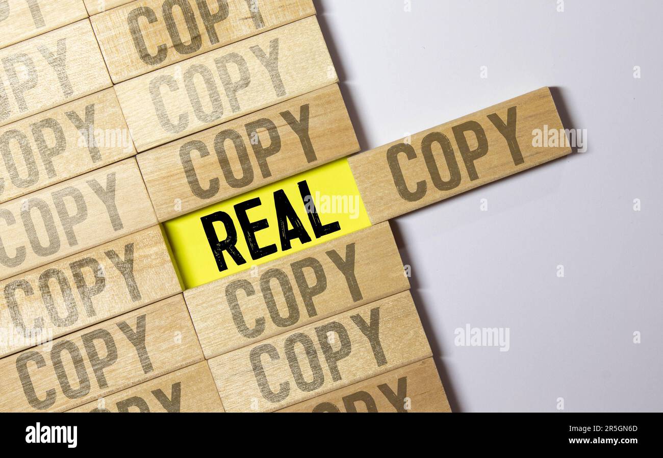 Real heal symbol. the words REAL and COPY in magnifying glasses Stock ...