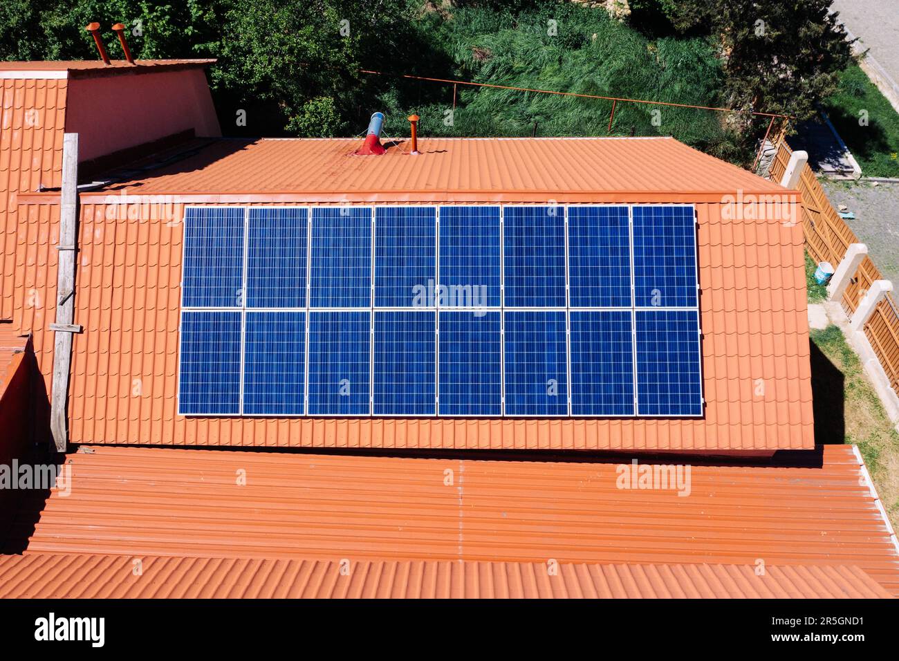 Solar panels installed on roof of house, aerial view Stock Photo - Alamy