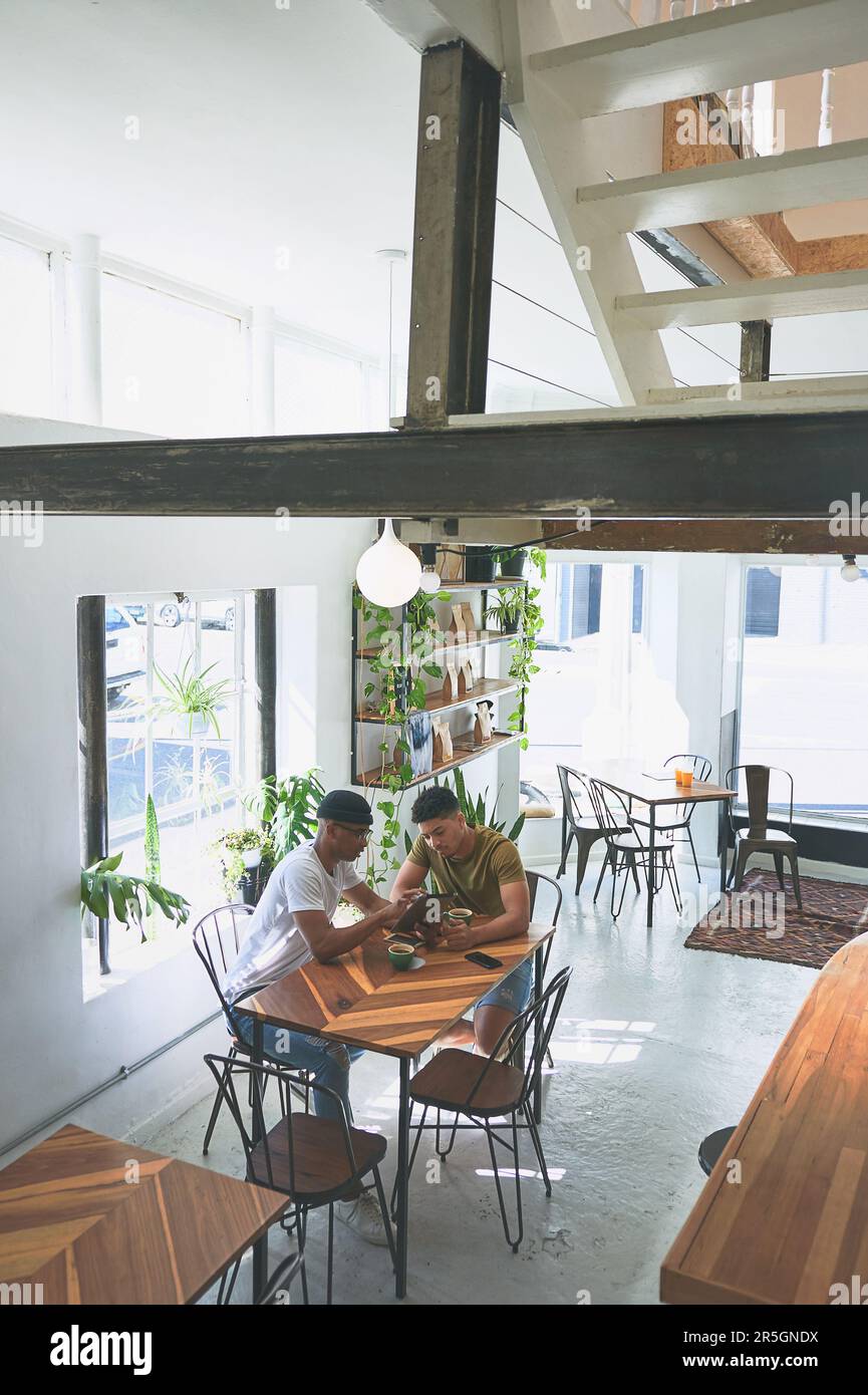 I always share my ideas with my best friend. Full length shot of two ...