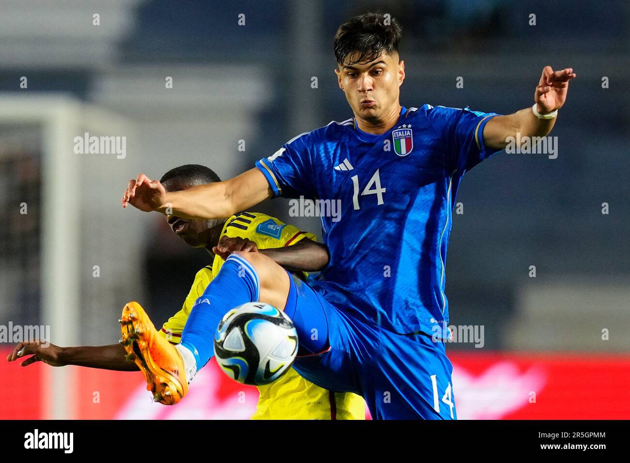 Italy's Gabriele Guarino, right, and Colombia's Yaser Asprilla battle ...