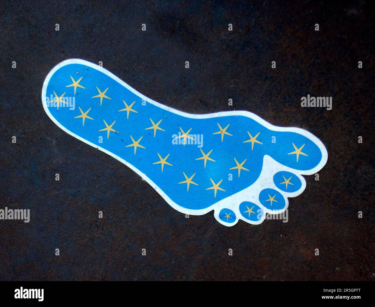 Footprint marked on pavement Stock Photo - Alamy