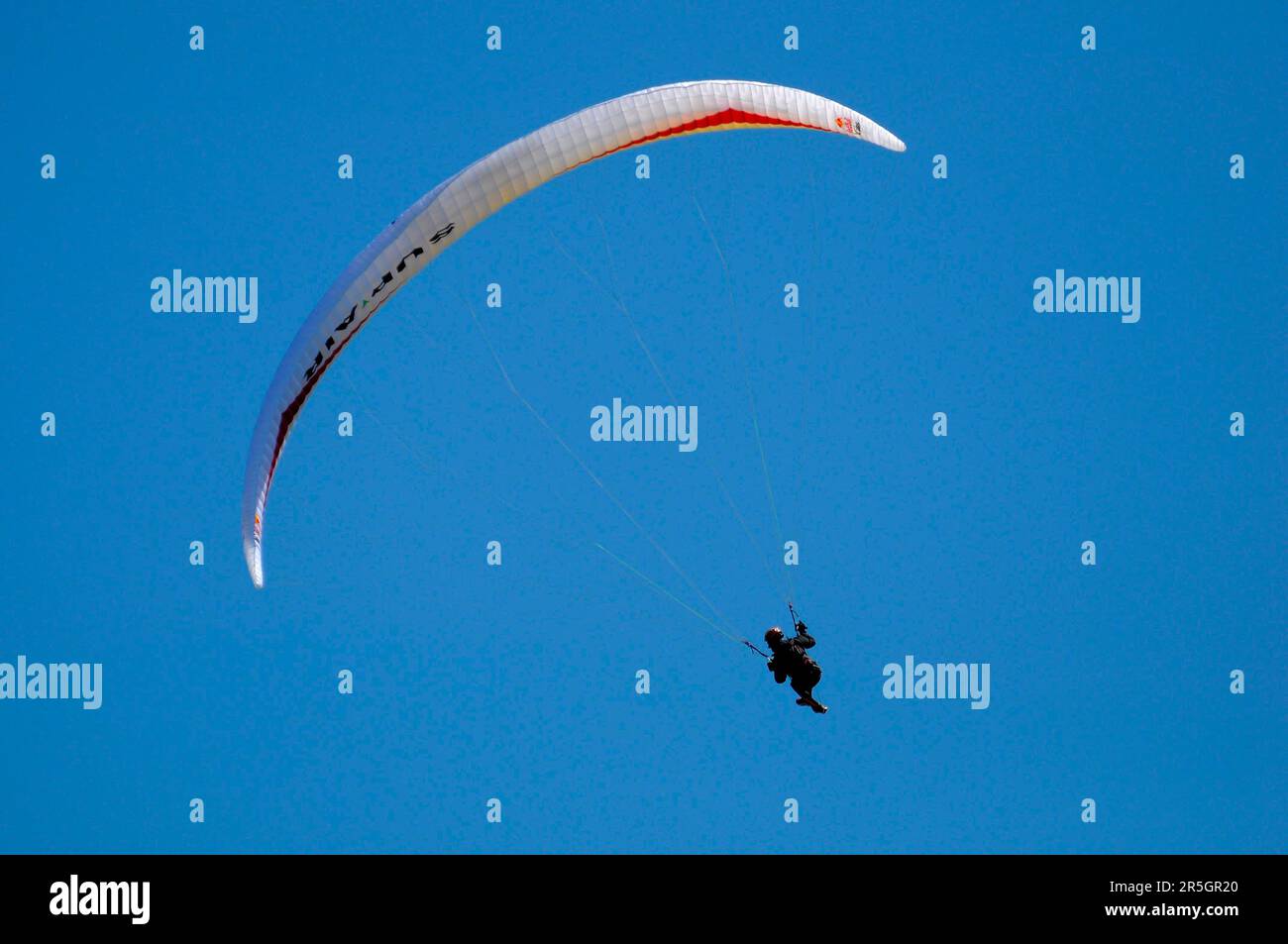 Paraglider at take-off Stock Photo - Alamy