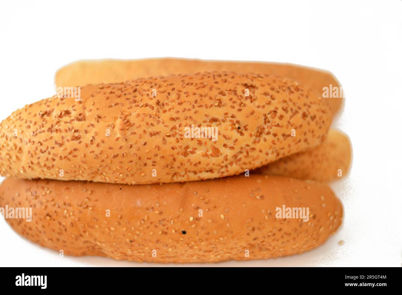 Long sesame bun bread, a fresh baked loaf of bread French Fino ready to ...