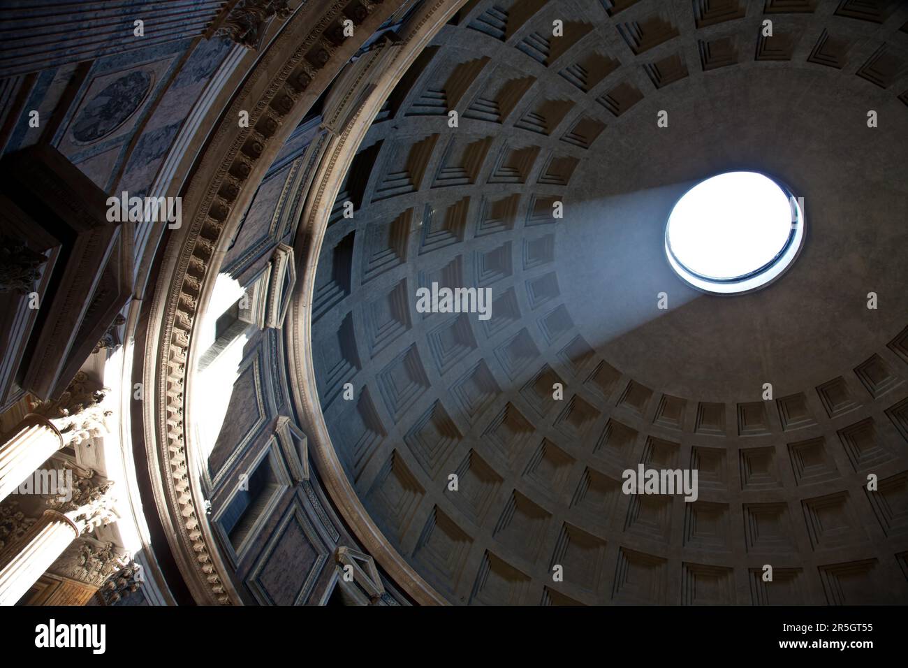 Interior of Rome Pantheon with the famous ray of light from the top ...