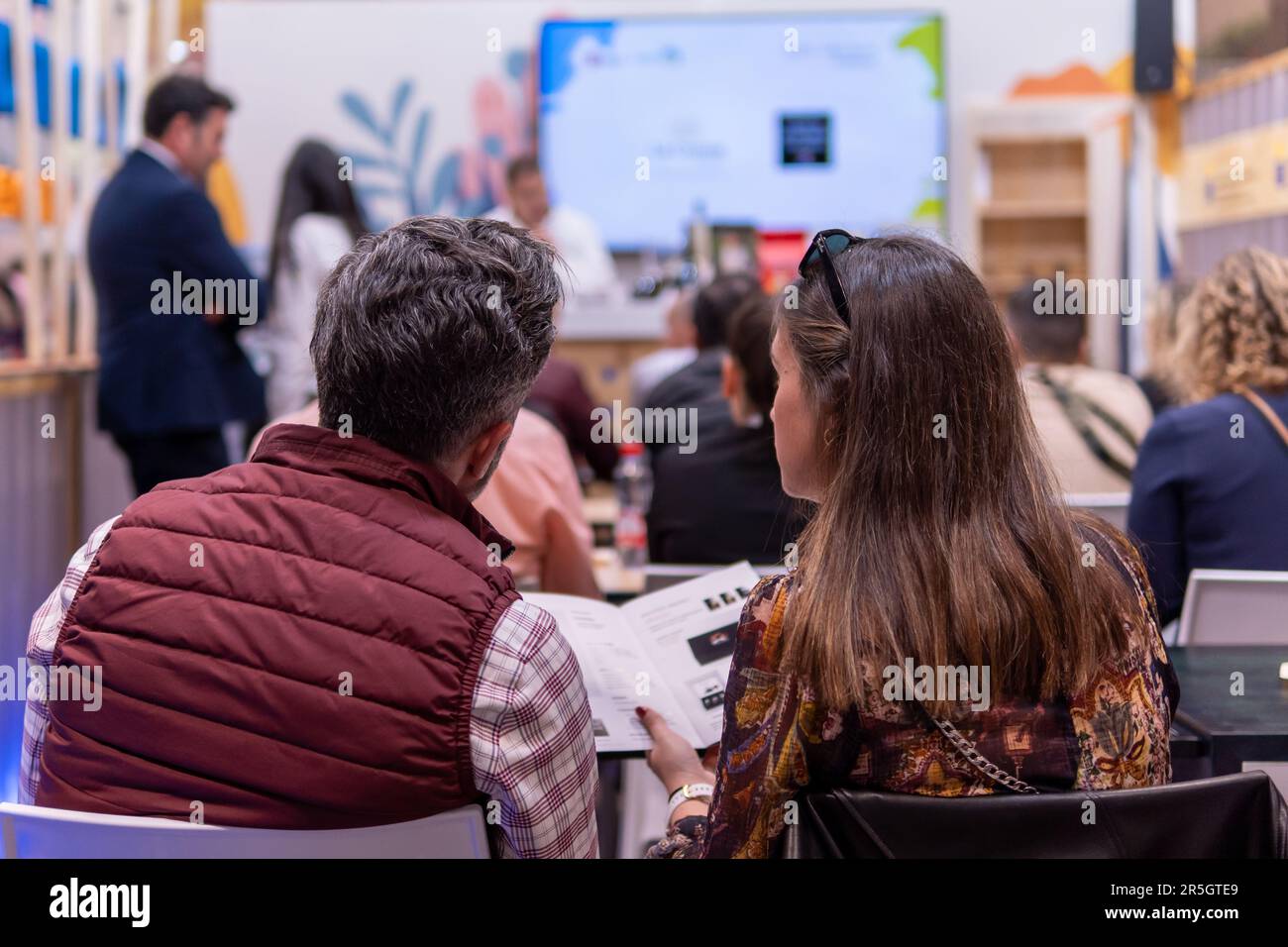 Man and woman checking menu at a cooking networking Stock Photo - Alamy
