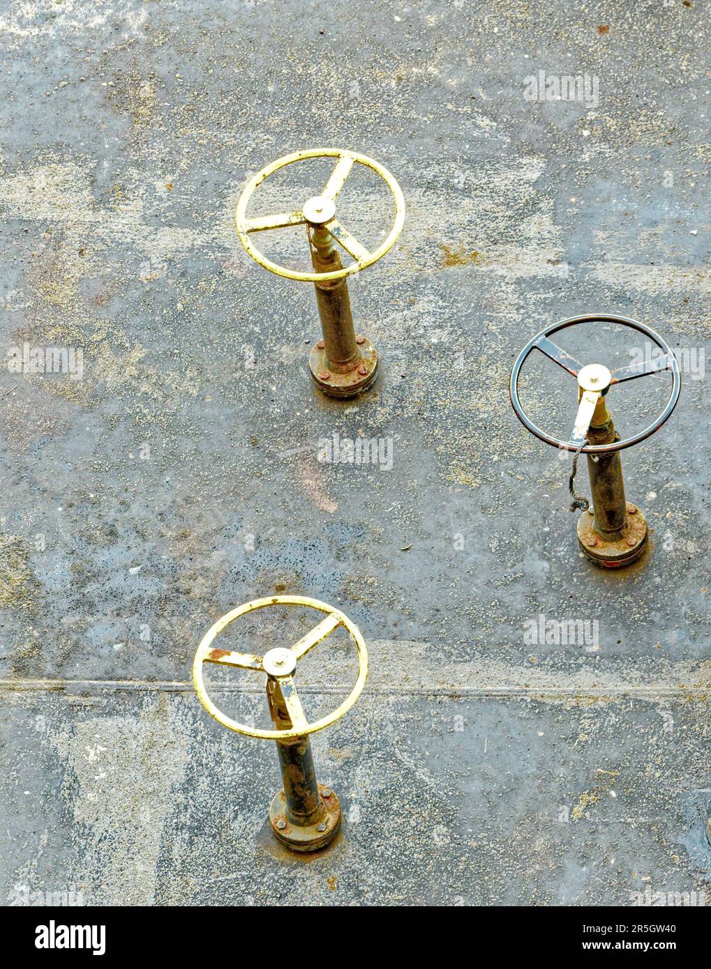 Black and Yellow Pipes and Valves on Refueling Barge Stock Photo - Alamy