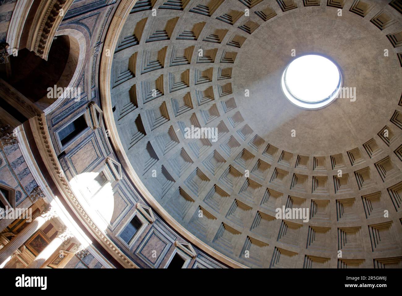 Interior of Rome Pantheon with the famous ray of light from the top ...
