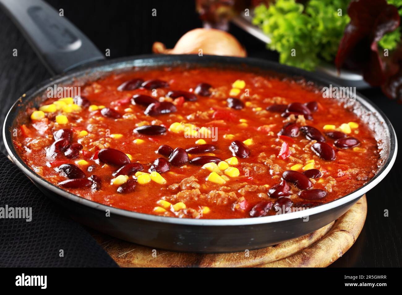 Chilli con carne cooked in the pan Stock Photo - Alamy