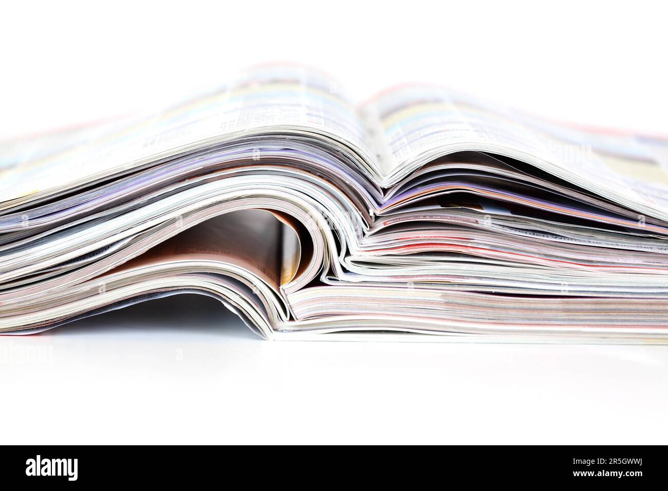 Batch of open magazines, close-up Stock Photo - Alamy