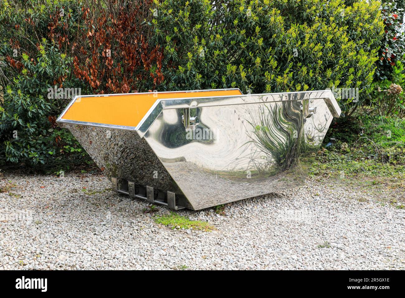 A polished stainless-steel skip by Ian Penna, entitled 'Skip of Light ...