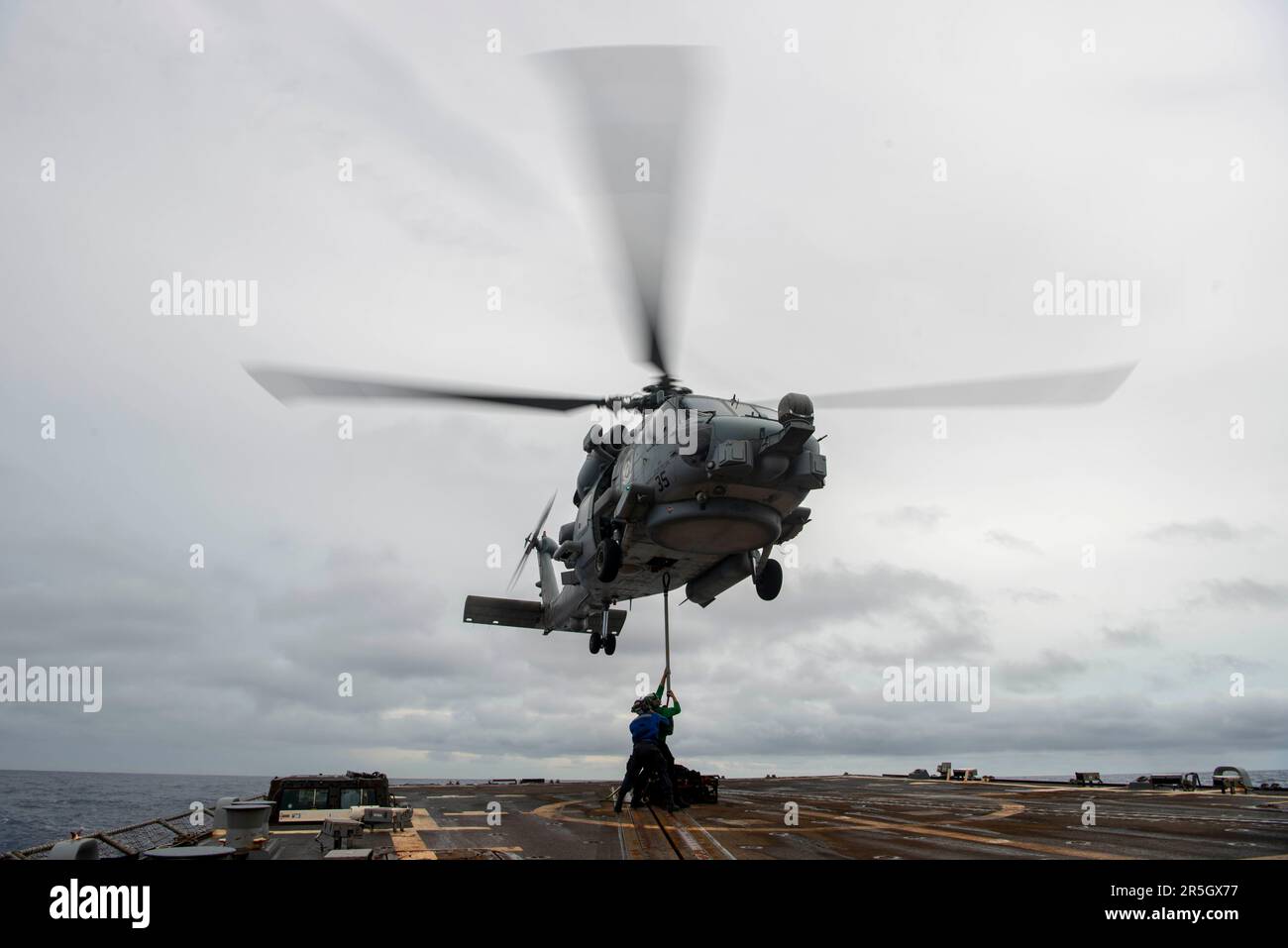 230530-N-MK109-1090 PHILIPPINE SEA (May 30, 2023) U.S. Sailors hook the ...