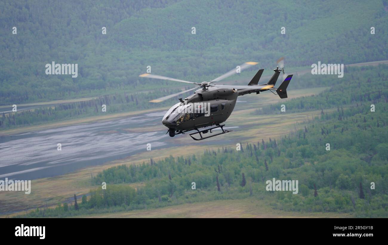 An Alaska Army National Guard LUH-72 Lakota helicopter flies alongside ...